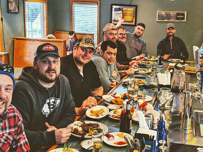 Happy diners with that unmistakable look of people who've just discovered something too good to keep secret but too special to share widely.