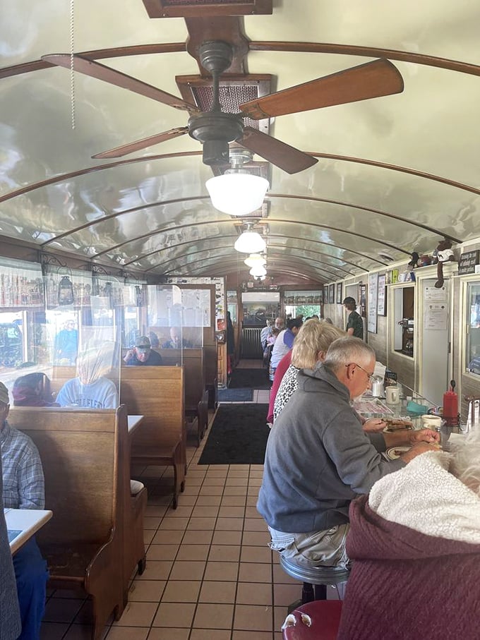 Where locals and visitors break bread together. That curved ceiling has absorbed decades of conversation, laughter, and the occasional "pass the syrup" request.