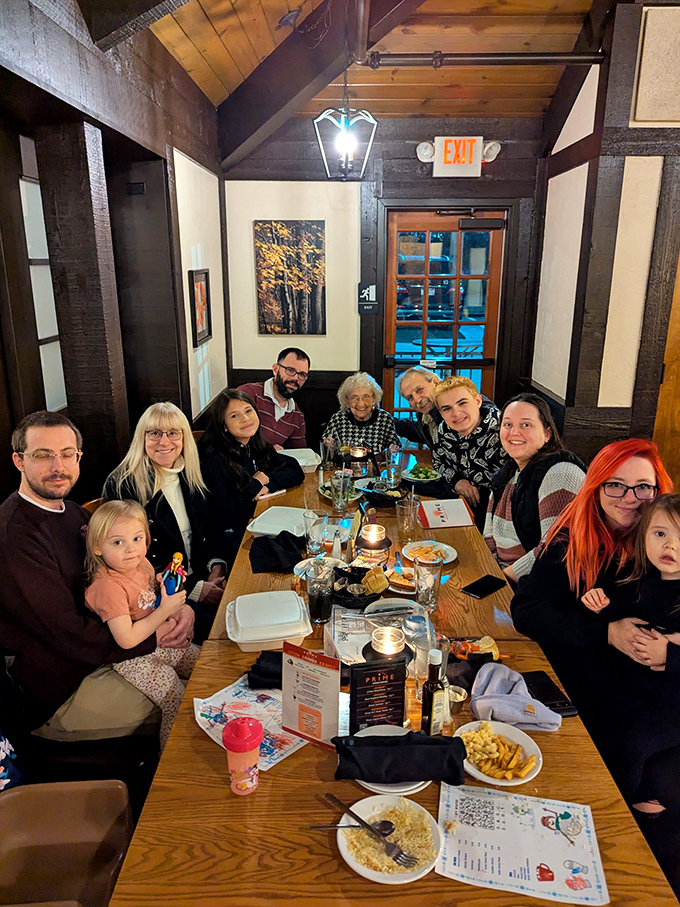A gathering of happy diners proving that great steaks create great memories, with empty plates telling tales of culinary satisfaction.
