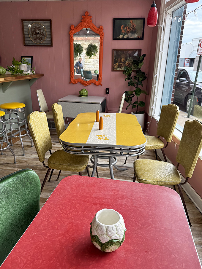 Retro tables in candy colors create a time-capsule dining room that's both Instagram-worthy and authentically nostalgic.