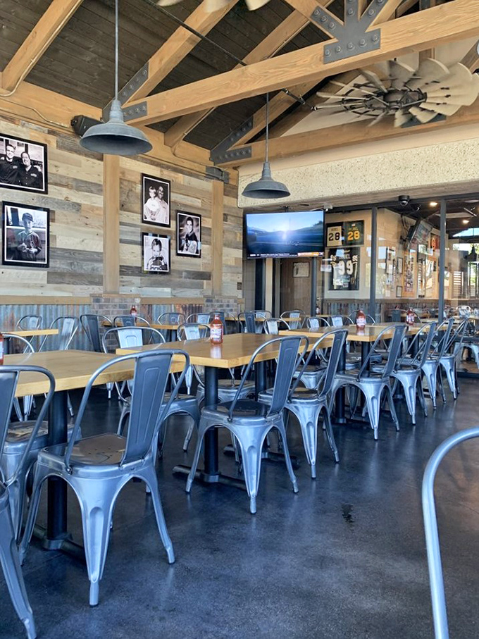 Not just a dining room, but a cathedral of carnivorous delights where metal chairs and wooden tables set the stage for meat-induced euphoria.