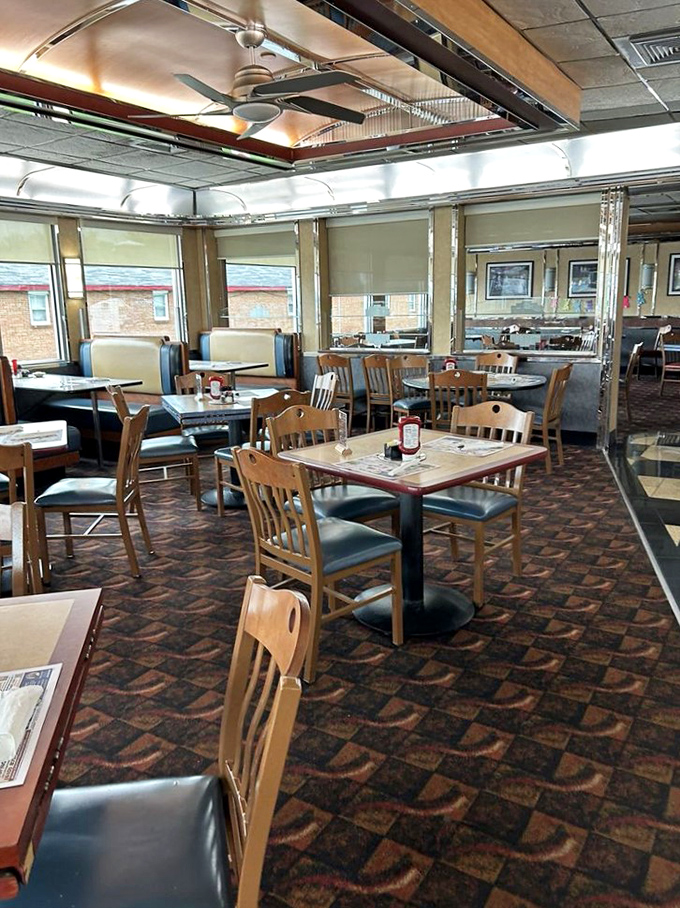 Comfortable seating arranged for conversations that flow as easily as the coffee, in a dining area designed for lingering rather than rushing.