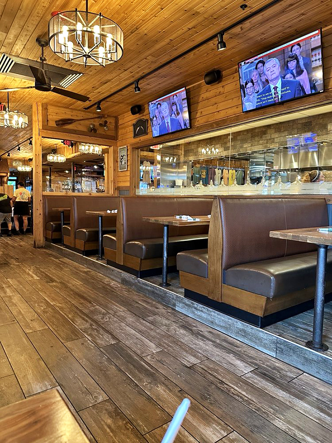 Comfortable booths that say, "Stay awhile," with lighting designed to make everyone look like they've just returned from vacation.