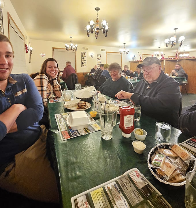 The dining room hums with conversation and laughter, where plaid shirts meet ketchup bottles in the democracy of deliciousness that defines Wisconsin dining.