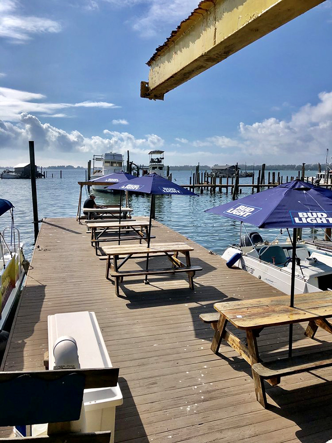 Dining with your toes practically in the water. These picnic tables on the dock offer million-dollar views without the South Beach prices.
