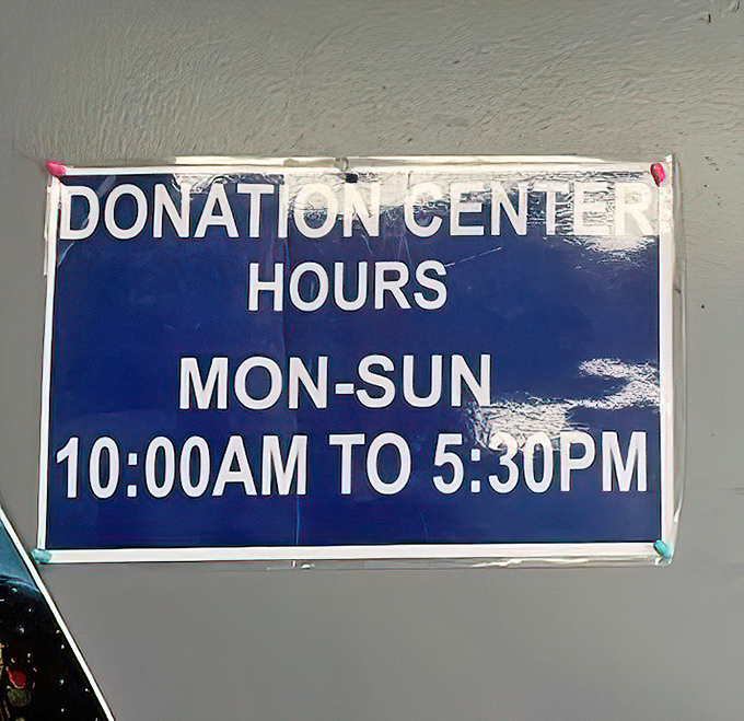 Donation hours posted like commandments, because timing is everything in the thrift store game.