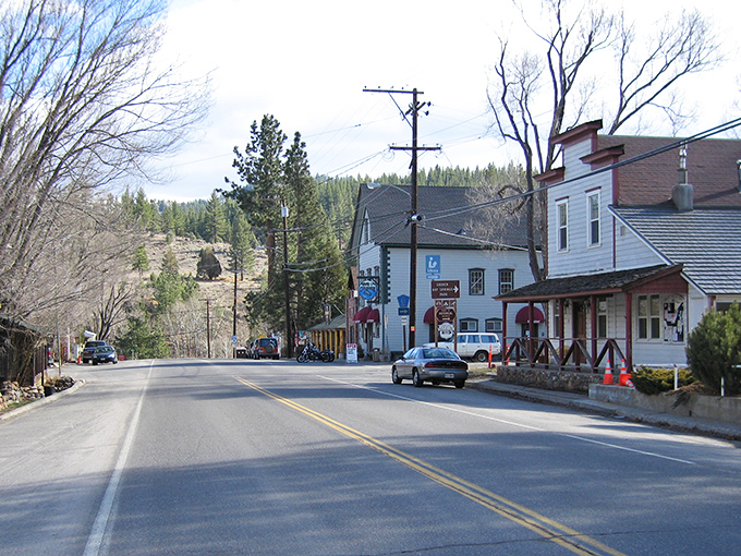 Downtown Markleeville stretches before you like an invitation to slow down. Two lanes, no traffic lights, and mountains standing guard.