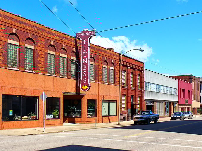 Downtown Zanesville's colorful storefronts line up like a welcoming committee, proving that small-town main streets still have more personality than any shopping mall.