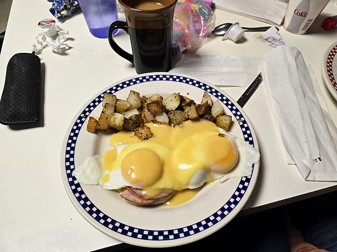 Eggs Benedict with hollandaise that flows like a yellow river of richness. The kind of breakfast that makes you want to high-five the chef.