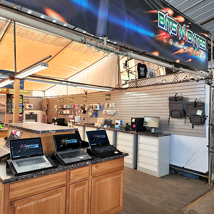 The tech oasis – where vintage market meets modern necessity, proving even swap meets have evolved beyond vinyl records and antique lamps.