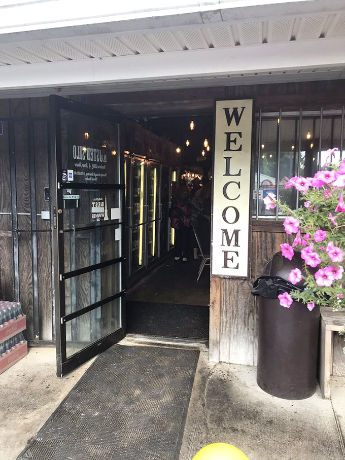 The "WELCOME" sign isn't just being polite&mdash;it's offering fair warning that your clothes will soon smell deliciously of smoke.