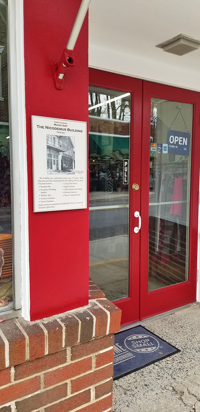 The welcoming red doors of the historic Nicodemus Building invite treasure hunters to step into a world of affordable possibilities.