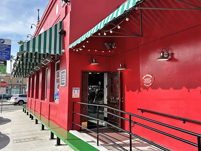 That vibrant red exterior with green-striped awnings isn't just a building &ndash; it's a landmark that's guided hungry Newport Beach visitors to seafood happiness for generations.
