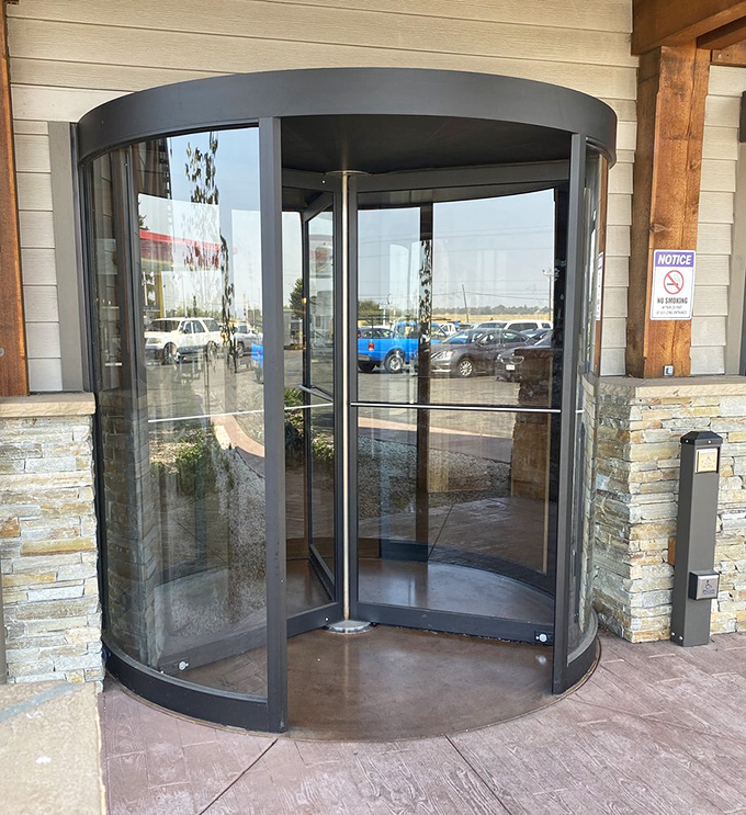 The revolving door entrance spins you into a world where modern hustle pauses for old-fashioned hospitality and hearty meals.