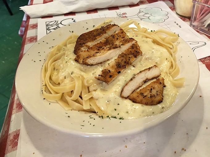 Fettuccine Alfredo with perfectly grilled chicken&mdash;a dish so simple yet so satisfying that it makes you question why anyone would complicate Italian food.