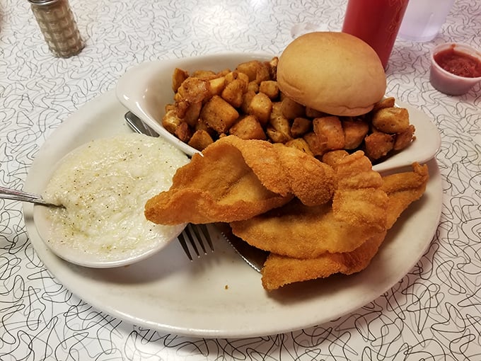 Golden-fried fish that would make any coastal town jealous, served inland with Tennessee hospitality. That tartar sauce looks house-made and heavenly.