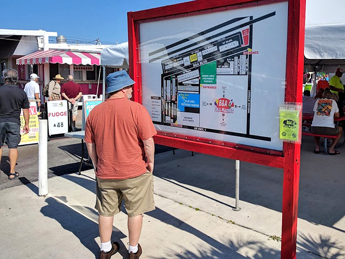 Even treasure hunting requires strategy, as a visitor studies the market map to plot his course through this labyrinth of potential discoveries.