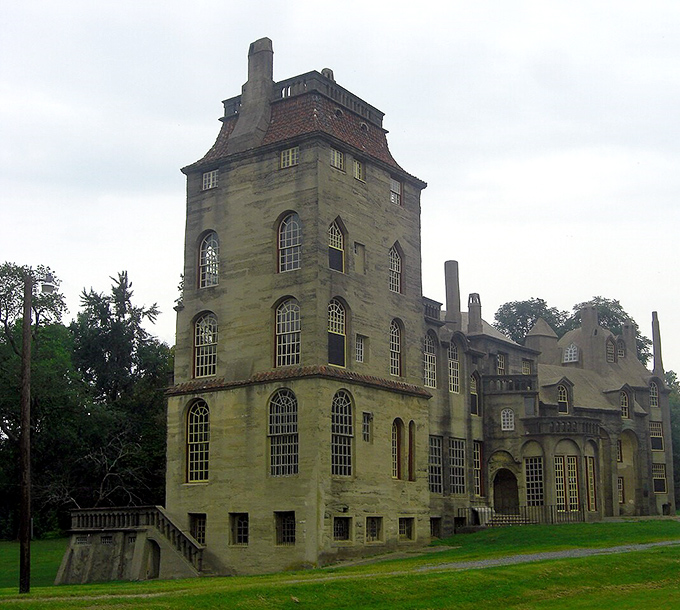 Fonthill Castle's imposing stone facade reveals the eccentric vision of Henry Mercer, where concrete dreams became architectural reality.
