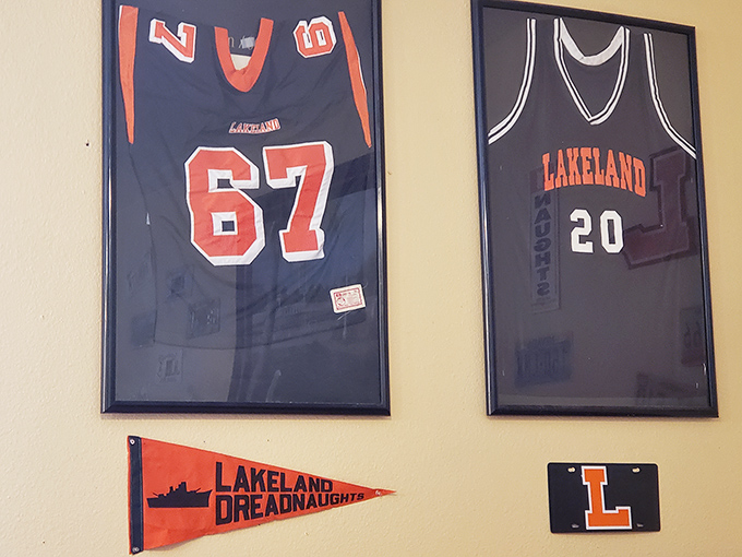 Local pride adorns the walls with framed Lakeland jerseys. In a chain restaurant world, these touches remind you exactly where you are.