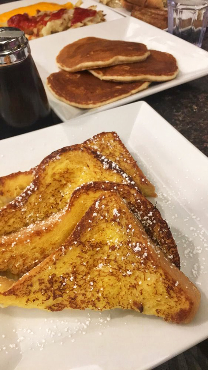 French toast dusted with powdered sugar like the first snow of winter. Breakfast or dessert? The line blurs deliciously here.