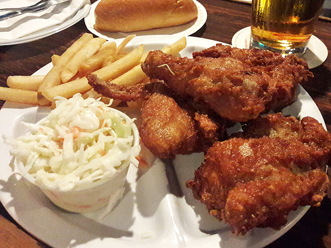 Friday night done right – when fried chicken brings the whole neighborhood together, one crispy piece at a time.
