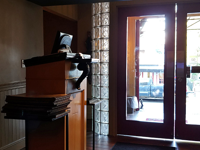 The entrance speaks of transitions&mdash;from the everyday world outside to the temple of gastronomy that awaits beyond those wooden doors.