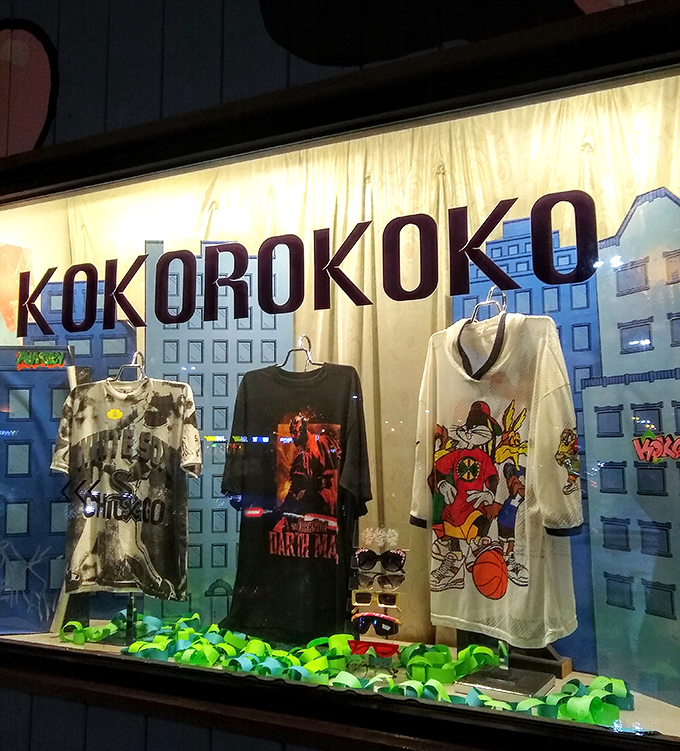 Window displays that stop sidewalk traffic, featuring Looney Tunes sportswear that somehow bridges the gap between ironic and genuinely cool again.