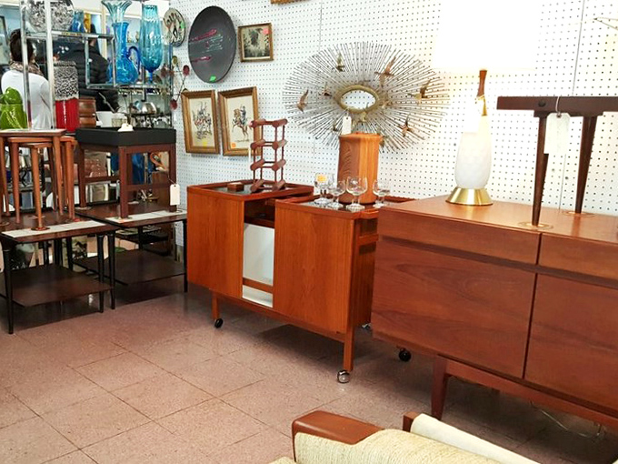 Mid-century furniture that makes your IKEA pieces suddenly look embarrassingly basic. Don Draper would approve of that credenza.