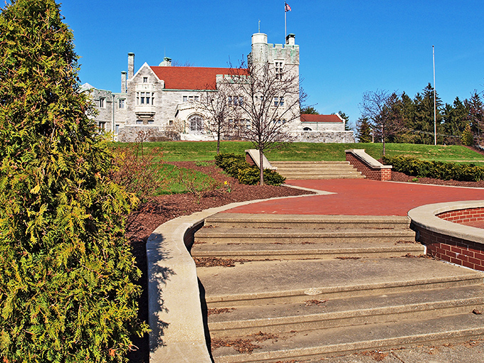 The curved brick pathway leads visitors on a royal approach. Your carriage awaits&mdash;or more likely, your sensibly parked Honda.