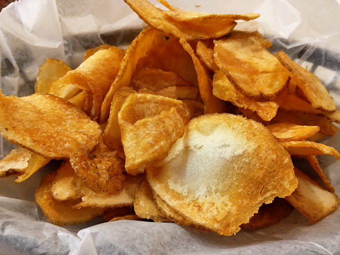 Homemade potato chips that crackle with freshness&mdash;each golden disc a testament to the care that goes into even the simplest sides.