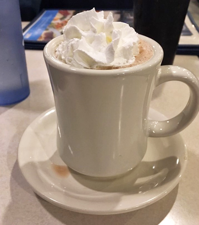 Hot chocolate crowned with a cloud of whipped cream&mdash;winter's perfect antidote served in a mug that feels like holding hands with an old friend.