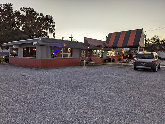 Dusk settles over Jimbo's, that magical hour when work is done and the only decision left is which barbecue delight to order.