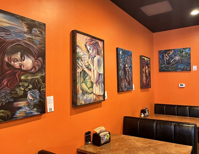 Vibrant artwork transforms dining into a cultural experience. These striking paintings prove Moon River feeds both stomach and soul.