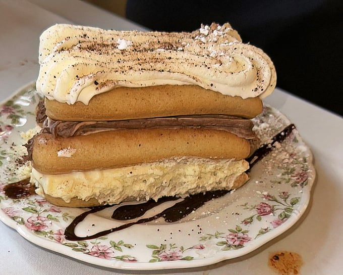 Tiramisu reimagined as a towering achievement&mdash;ladyfingers and mascarpone stacked with the confidence of a dessert that knows its worth.