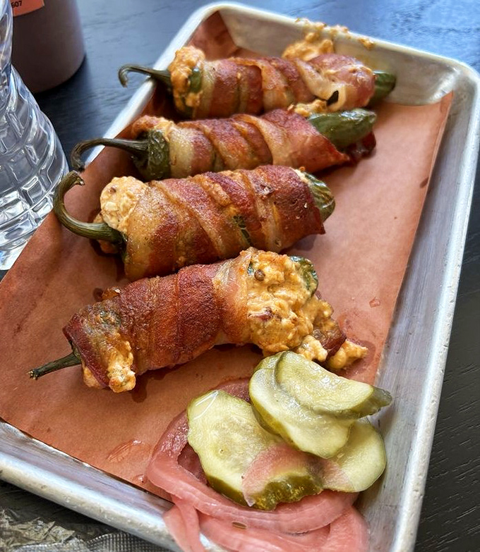 Jalape&ntilde;o poppers wrapped in bacon &ndash; because everything's better with bacon, especially things that are already perfect.