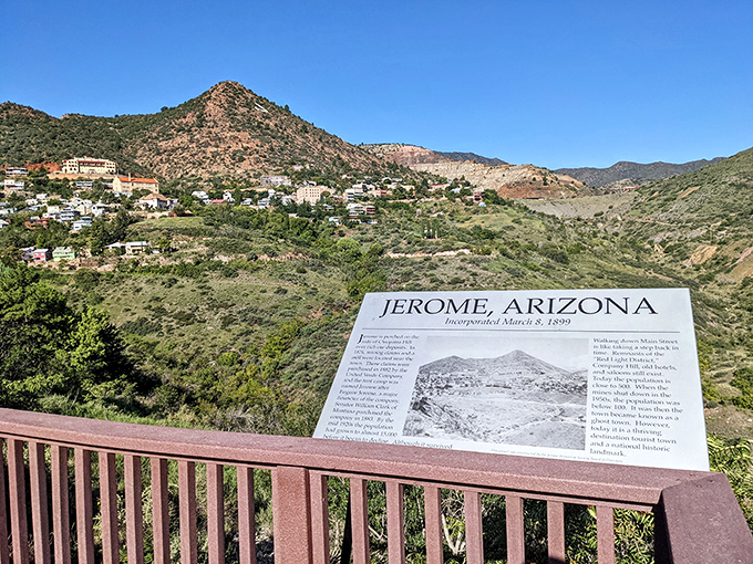 This informational plaque offers context, but nothing prepares you for the breathtaking reality of Jerome's precarious perch on Cleopatra Hill.