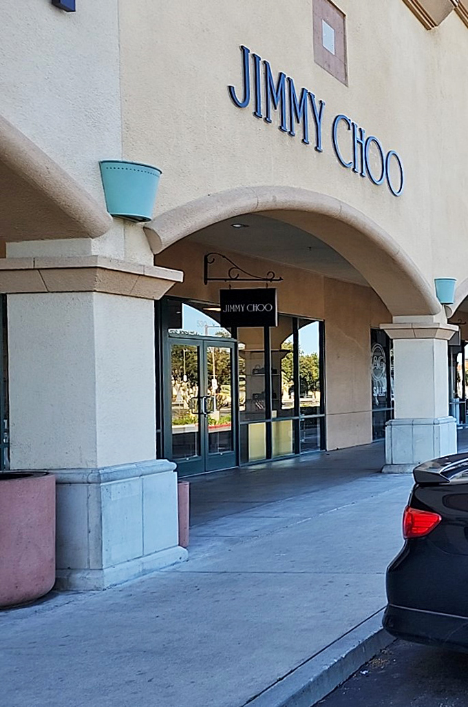 Jimmy Choo: where shoes that normally cost a mortgage payment become merely an extravagant splurge. The arch entrance is appropriately grand.