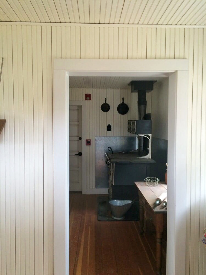 This humble kitchen, with its cast iron stove and simple tools, reminds us how much work went into the daily rituals of nourishment.