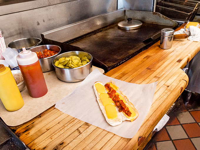 Behind the scenes, the well-seasoned grill and prep station reveal where the magic happens&mdash;simple ingredients transformed by experience.