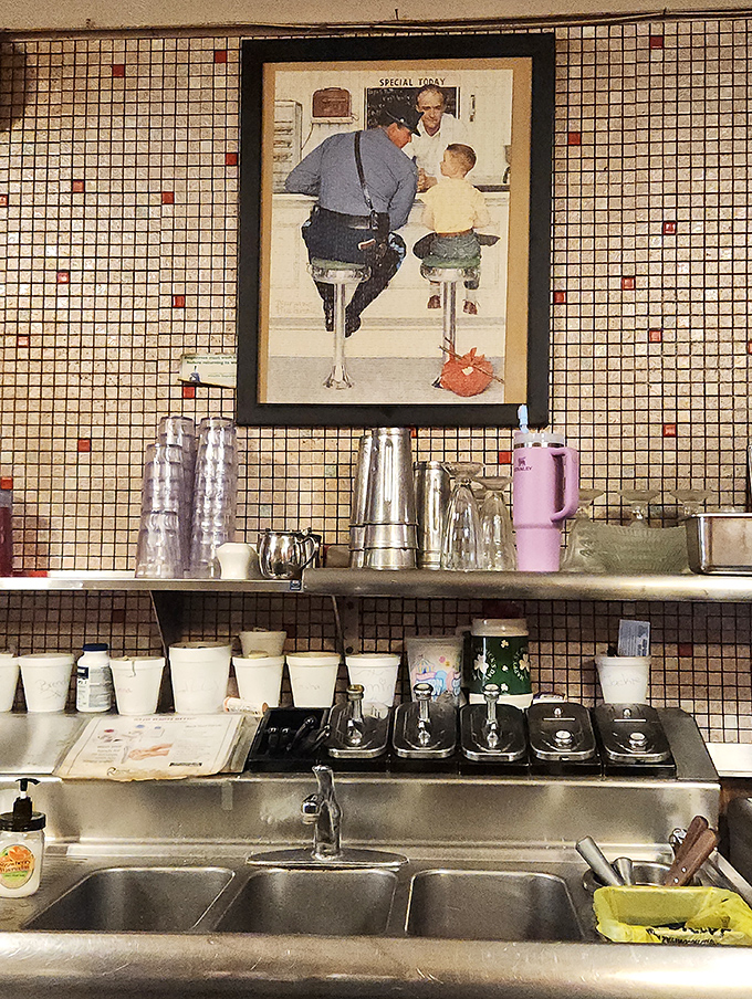 Behind every great diner is a sink that's seen it all, with Norman Rockwell keeping watch over the organized chaos that produces comfort by the plateful.