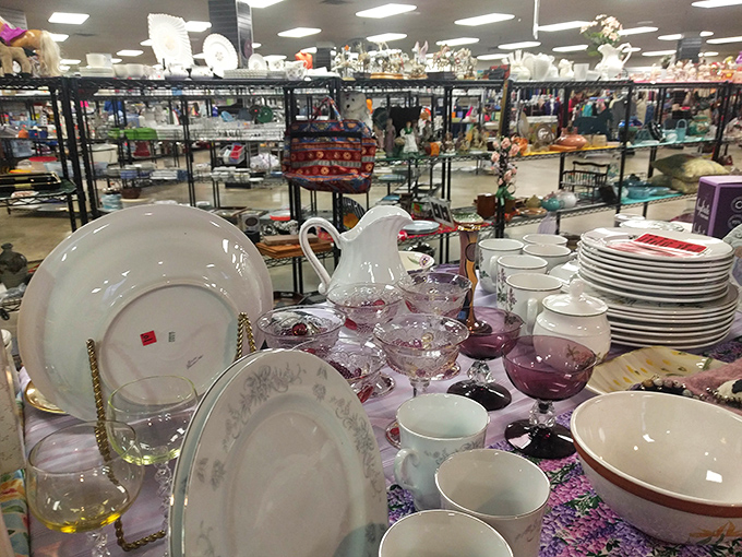 Fine china and everyday dishes share shelf space in perfect harmony, like an episode of "Downton Abbey" meets "Roseanne" in tableware form.