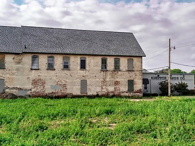 History wears its age honestly at the old Kuepper Favor building, where weathered bricks tell stories of Peru's industrial past.