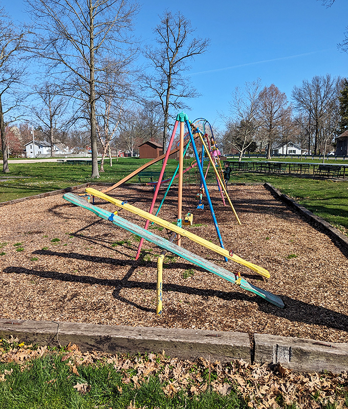 Colorful playground equipment awaits young adventurers at Lehman Park. Childhood joy needs no translation, whether in Indiana or Switzerland.