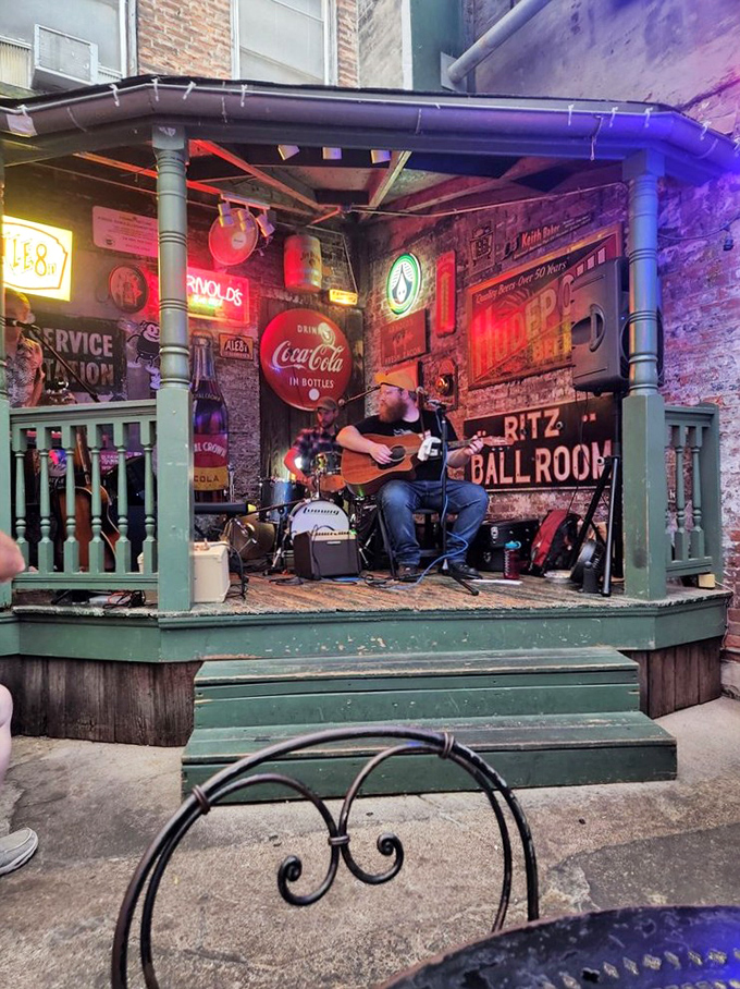 Live music in a setting that feels like your coolest friend's backyard. Vintage signs and colored lights create the perfect backdrop for sonic memories.