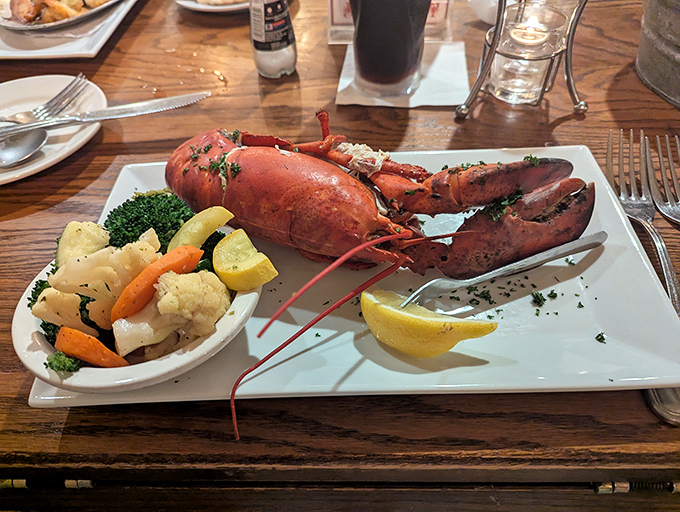 This lobster didn't just arrive on your plate &ndash; it made a grand entrance, dressed in its finest red with vegetables as supporting actors.