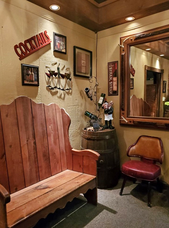 A cozy waiting nook with wooden bench seating—where anticipation of prime rib becomes almost as delicious as the meal itself.