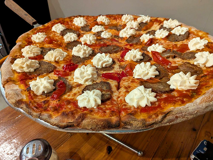 Not your average pizza &ndash; those dollops of cream against the savory meatballs and roasted peppers create a flavor symphony that makes ordinary pizza weep with jealousy.