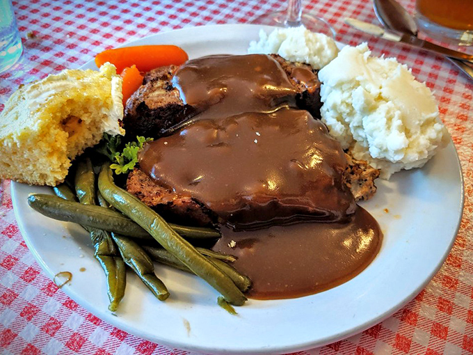 Meatloaf drowning in gravy alongside vegetables that actually taste like vegetables &ndash; imagine that revolutionary concept.