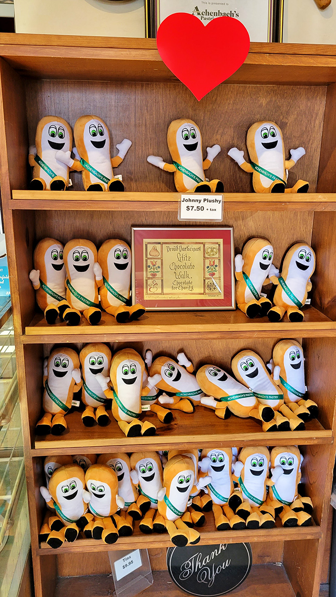 Meet the Long John mascots&mdash;the unofficial ambassadors of Achenbach's. When your signature pastry has its own plush toy, you know you've made it.