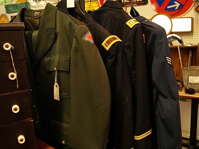 Military uniforms stand at attention, representing service and sacrifice. These aren't just clothes&mdash;they're chapters of American history.